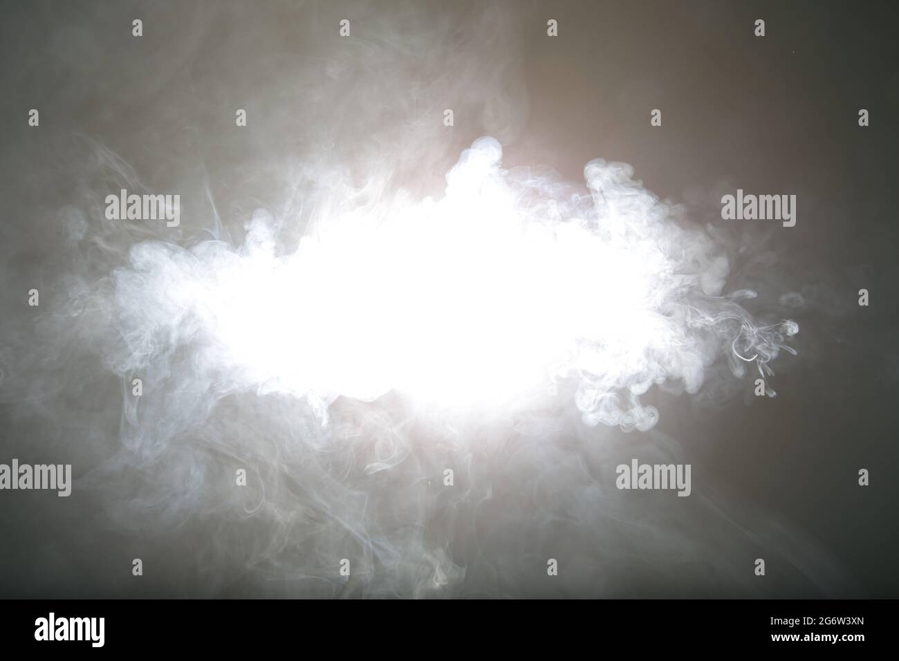 Artificial magic light illuminates smoke isolated on dark background ...