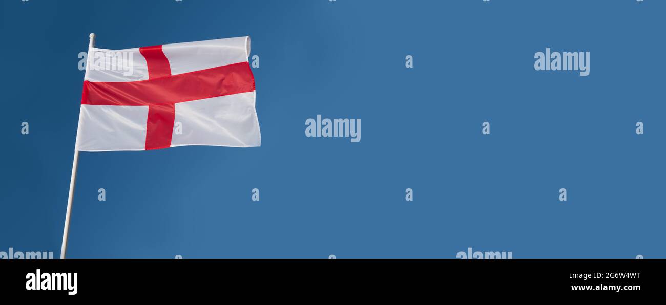 Flag of England on blue sky background. Empty copy space. Flag of ...