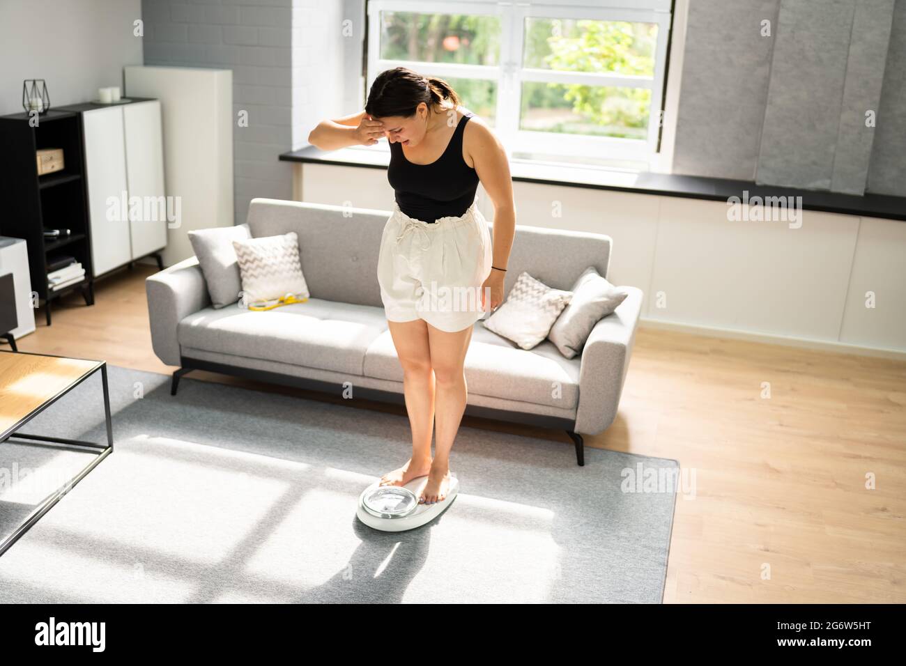 Overweight woman sad hi-res stock photography and images - Alamy
