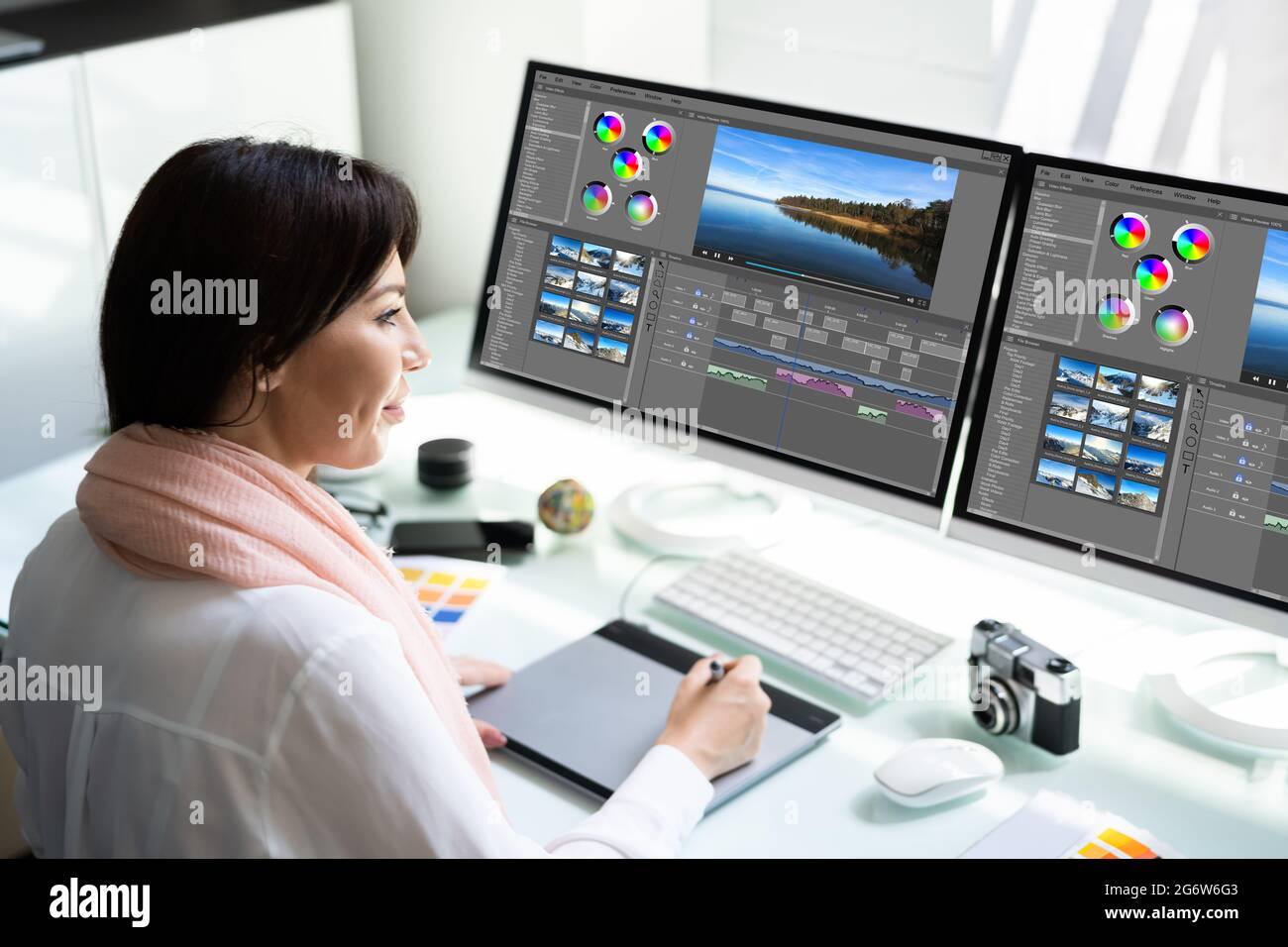 Young Female Editor Editing Video On Computer In Office Stock Photo - Alamy