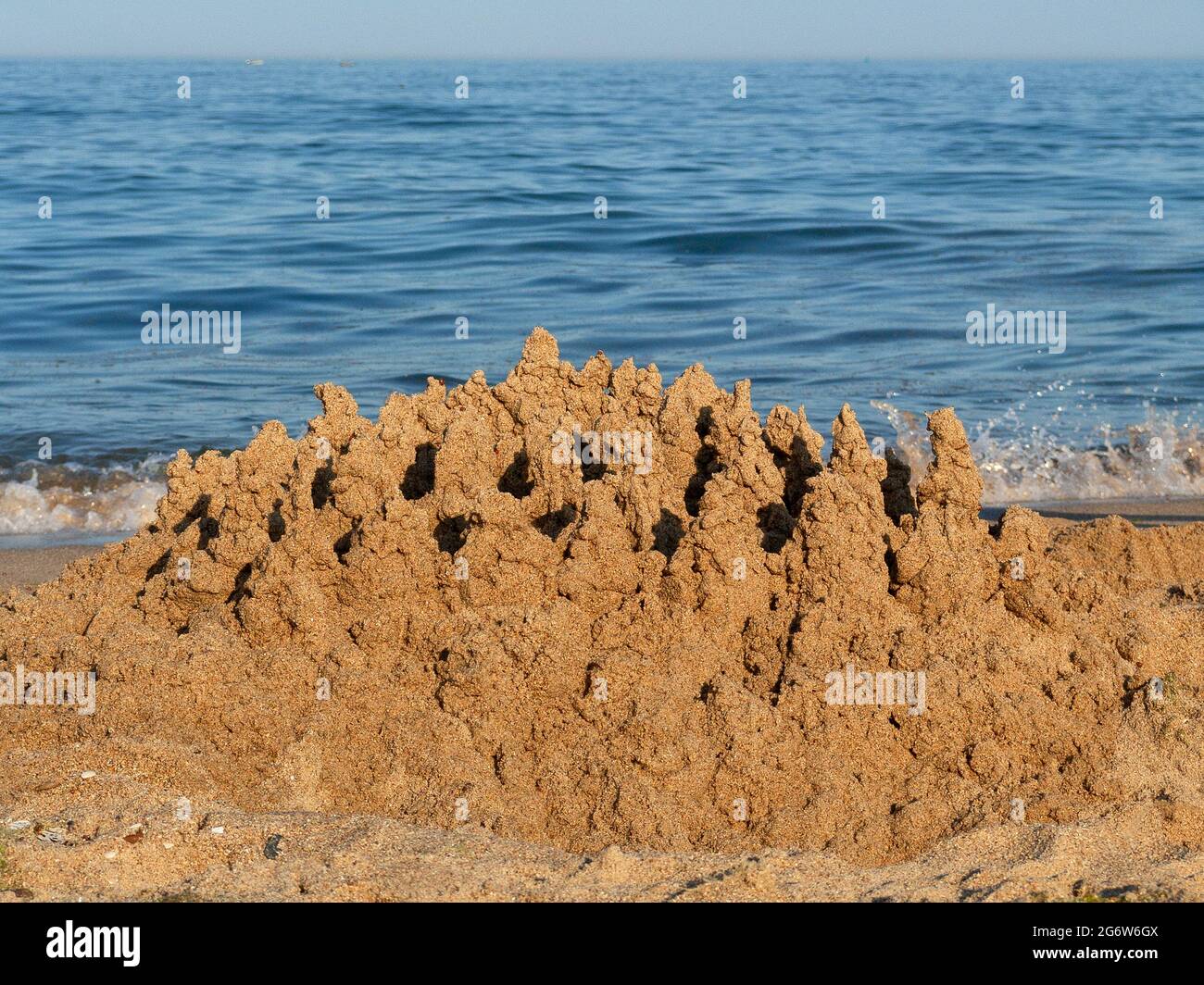 Built House sand castle with towers on the south shore of the sandy ...
