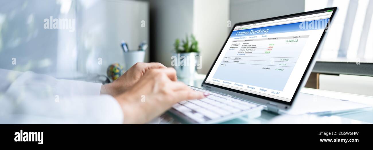 Online Banking Checking Balance And Making Money Transfer Stock Photo ...