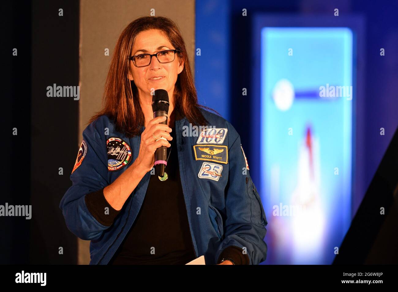 Retired NASA Astronaut Nicole Stott moderates the celebration marking ...