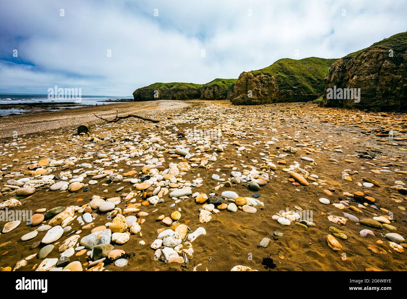 Sunny Cliffs and beach at Blackhall Rocks and Cromdon Dene Beach Stock ...