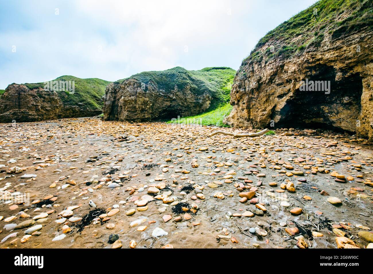 Sunny Cliffs and beach at Blackhall Rocks and Cromdon Dene Beach Stock ...