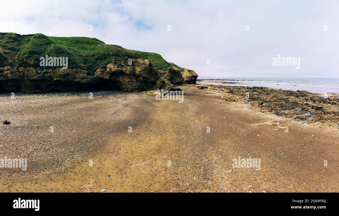 Sunny Cliffs and beach at Blackhall Rocks and Cromdon Dene Beach Stock ...