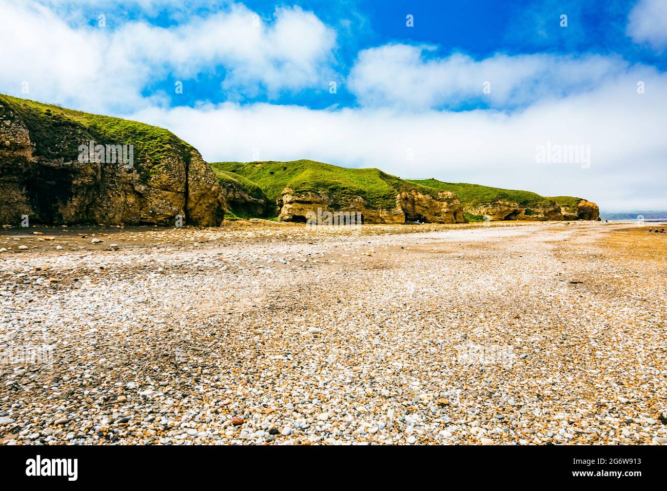 Sunny Cliffs and beach at Blackhall Rocks and Cromdon Dene Beach Stock ...