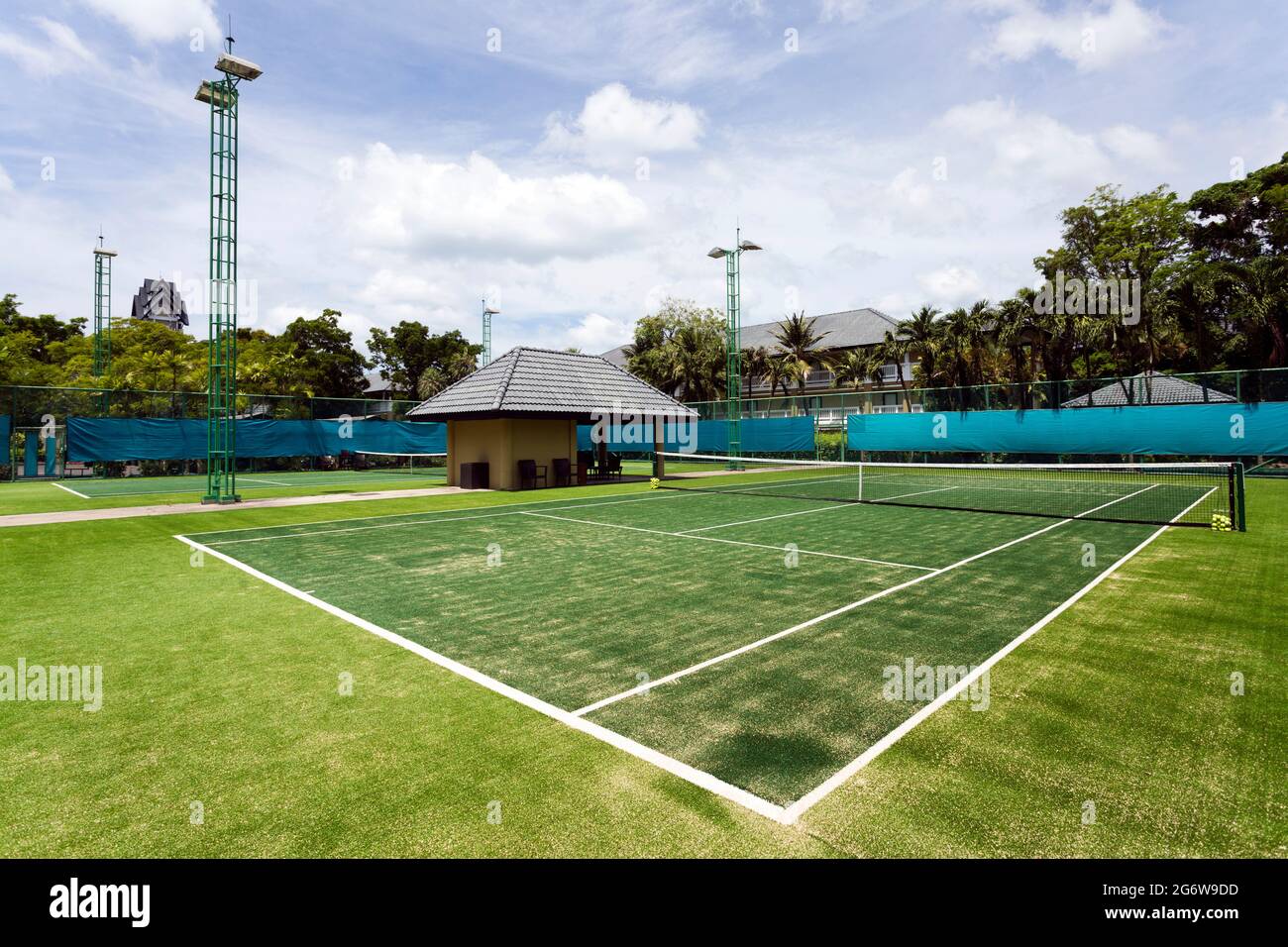 Grass tennis court at the Angsana Laguna Phuket hotel in Phuket ...