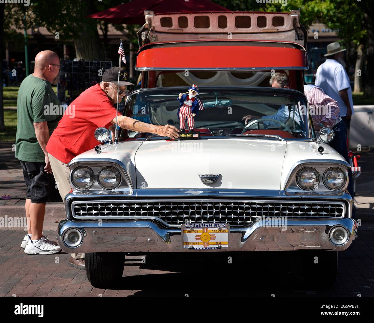 The owner of a 1959 Ford Fairlane puts an Uncle Sam action figure on ...
