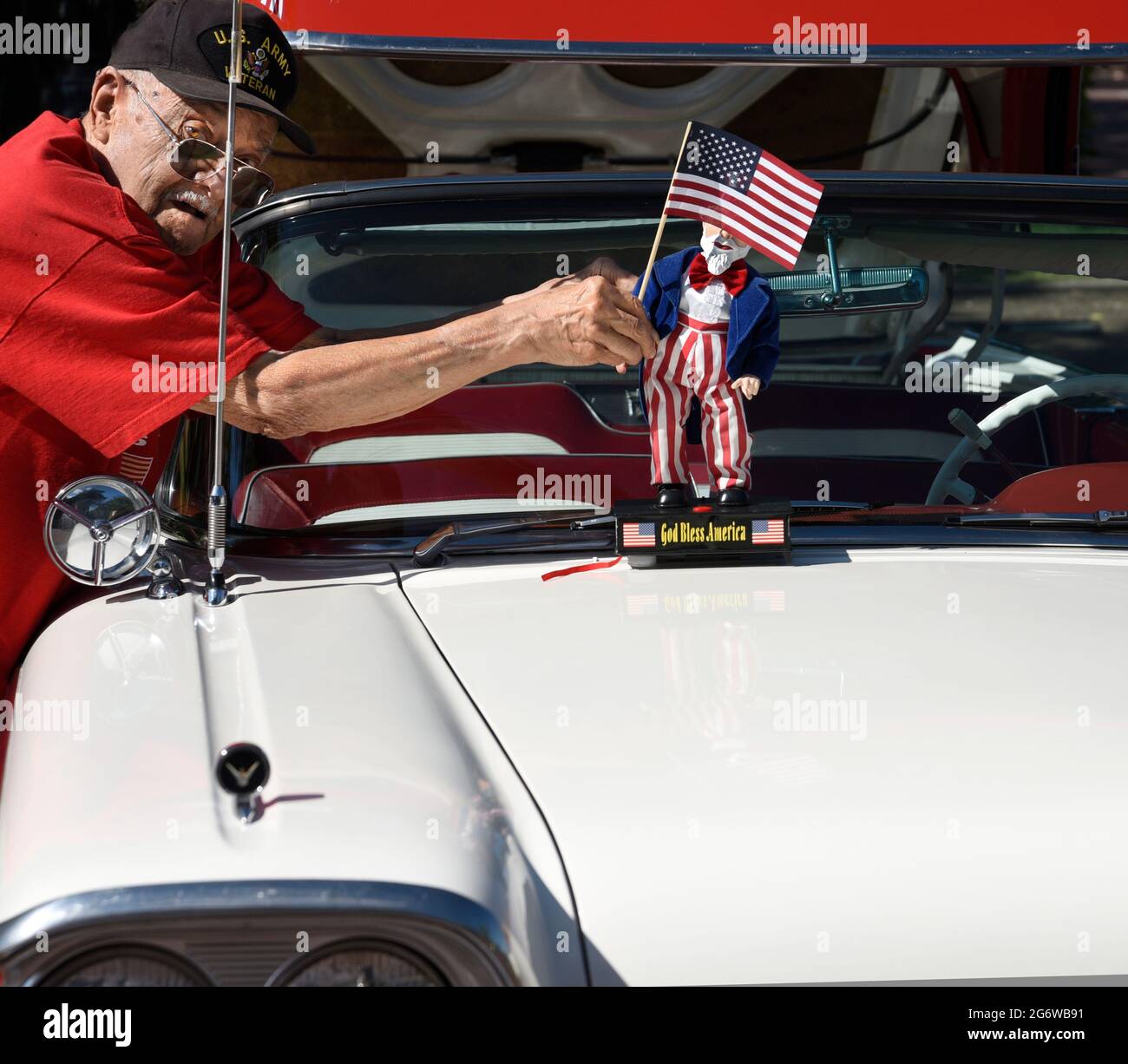 The owner of a 1959 Ford Fairlane puts an Uncle Sam action figure on ...