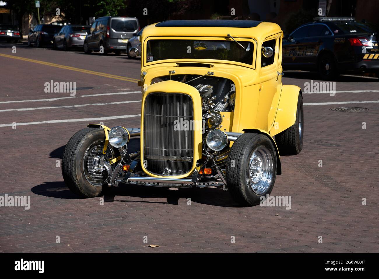 A customized hot rod on display at a Fourth of July classic car show in ...