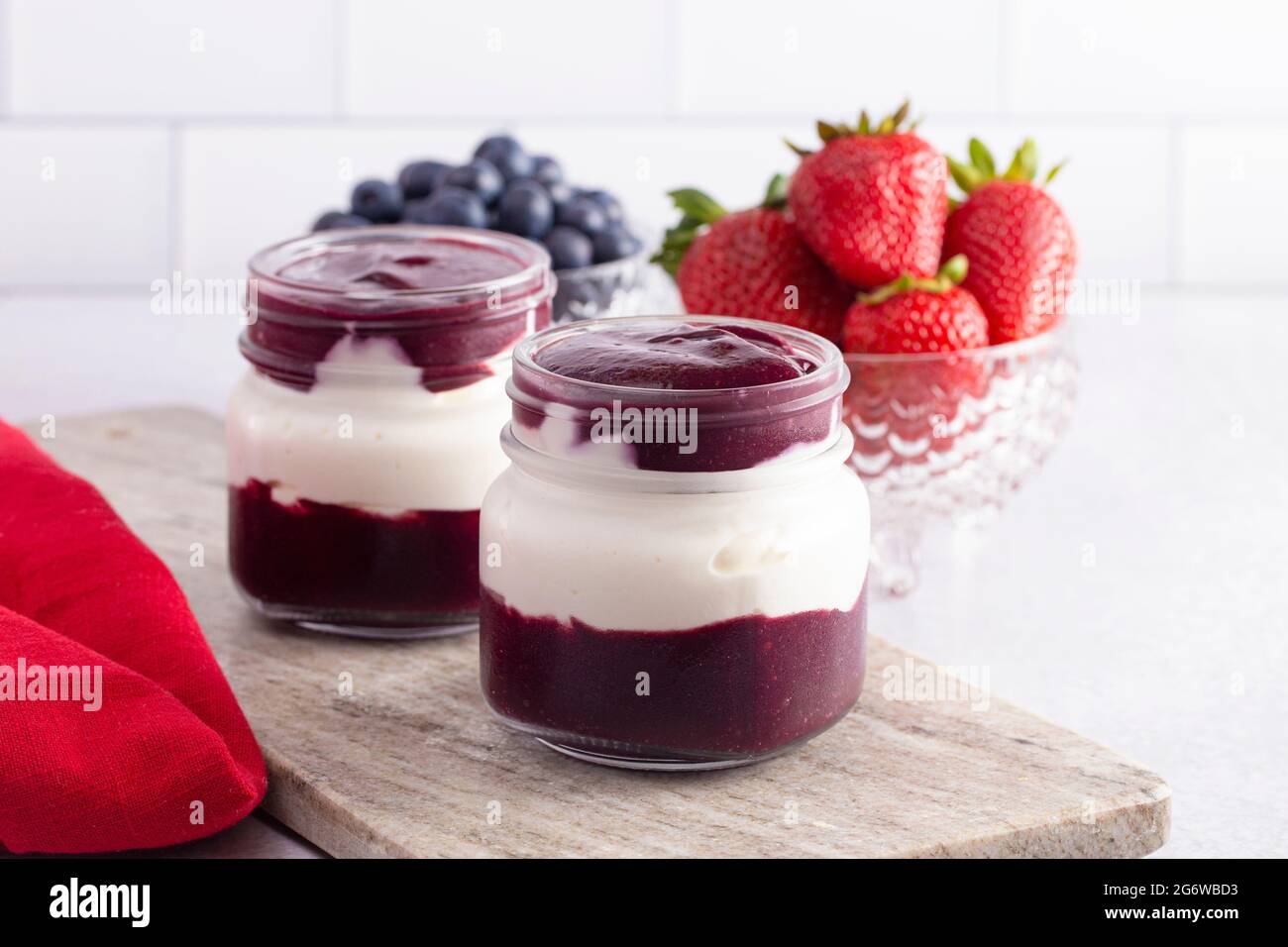 Yogurt and Berry Puree in a Glass Jar for a Healthy Breakfast Stock ...