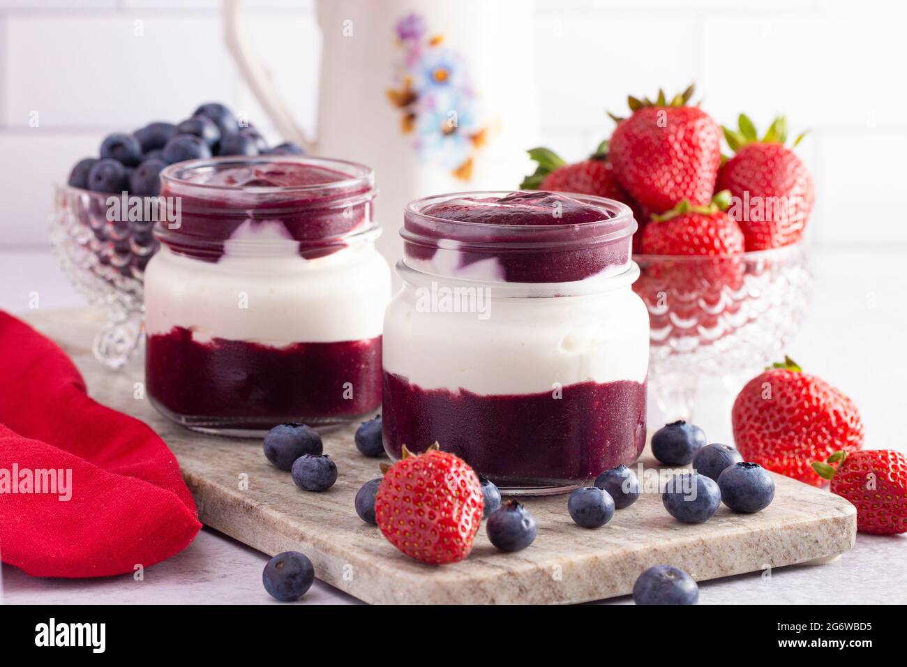 Yogurt and Berry Puree in a Glass Jar for a Healthy Breakfast Stock ...