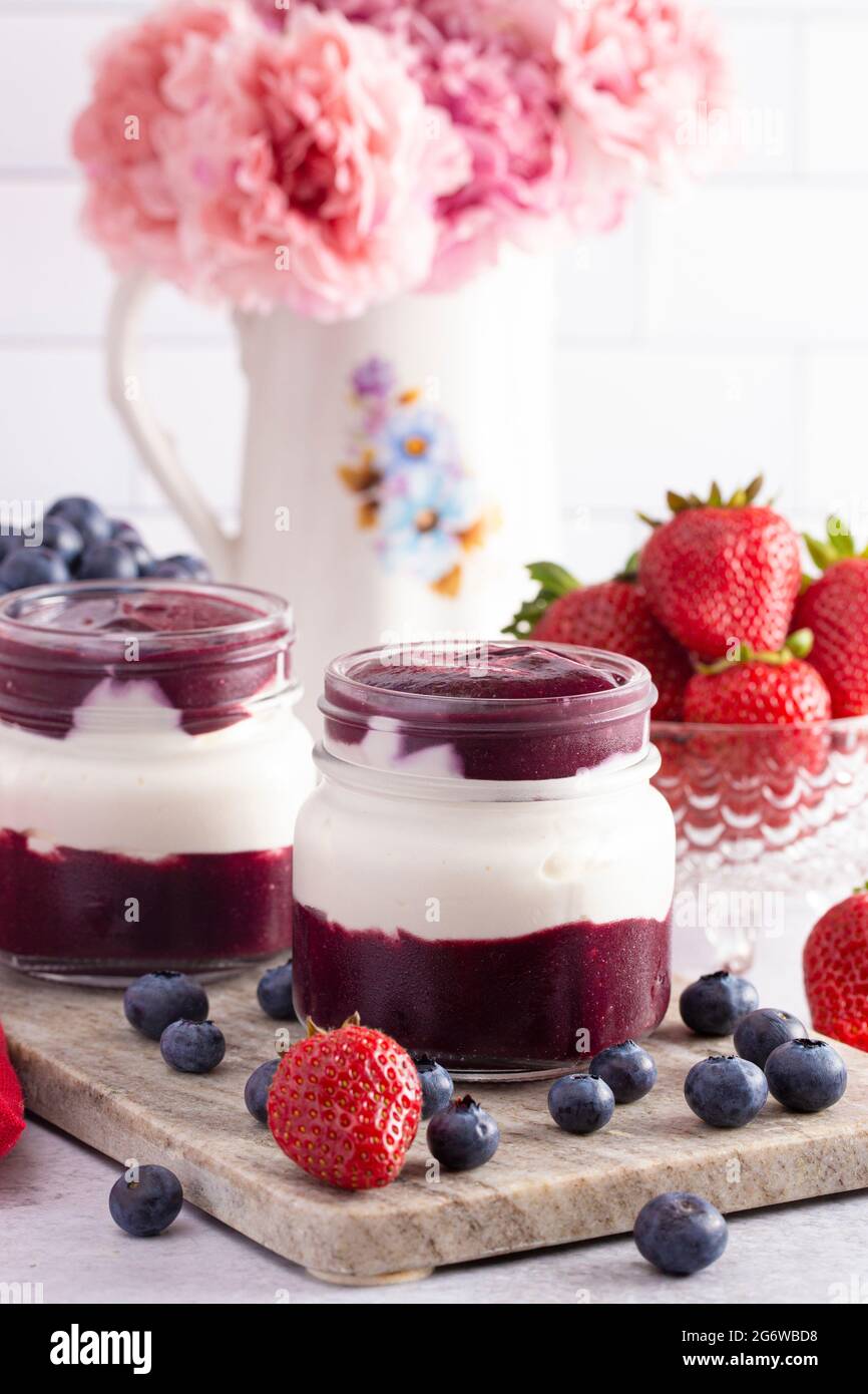 Yogurt and Berry Puree in a Glass Jar for a Healthy Breakfast Stock ...