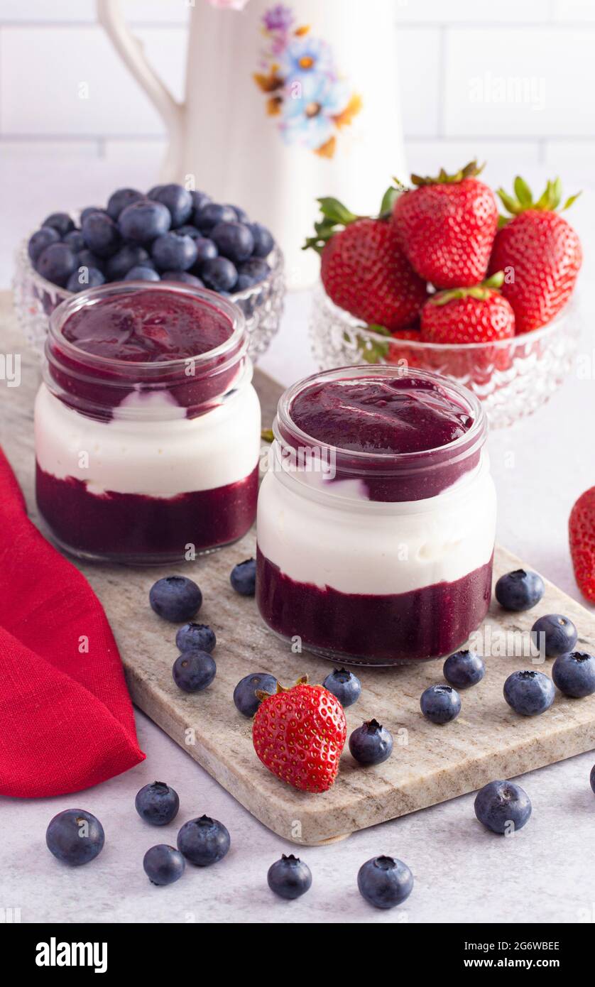 Yogurt and Berry Puree in a Glass Jar for a Healthy Breakfast Stock ...