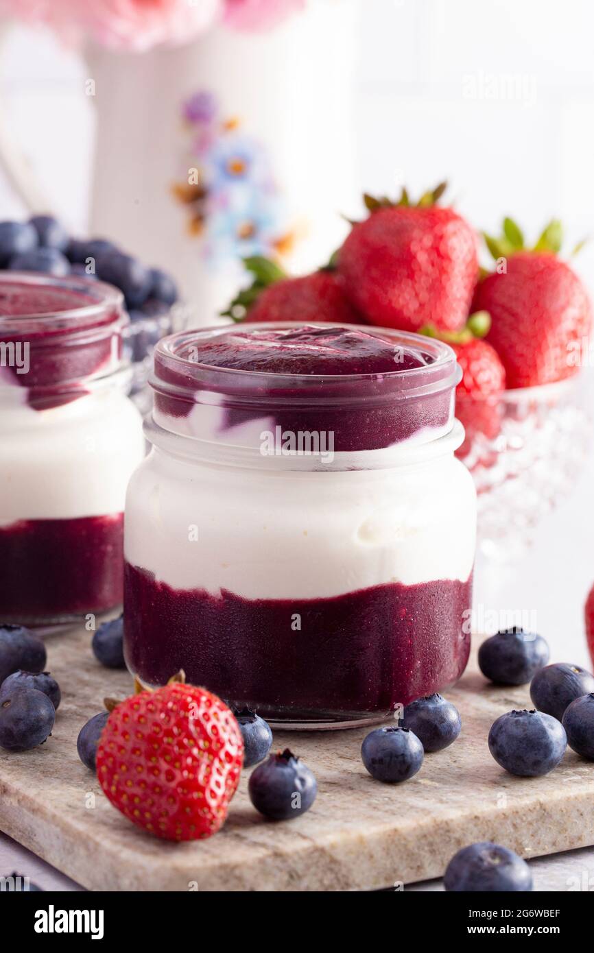 Yogurt and Berry Puree in a Glass Jar for a Healthy Breakfast Stock ...
