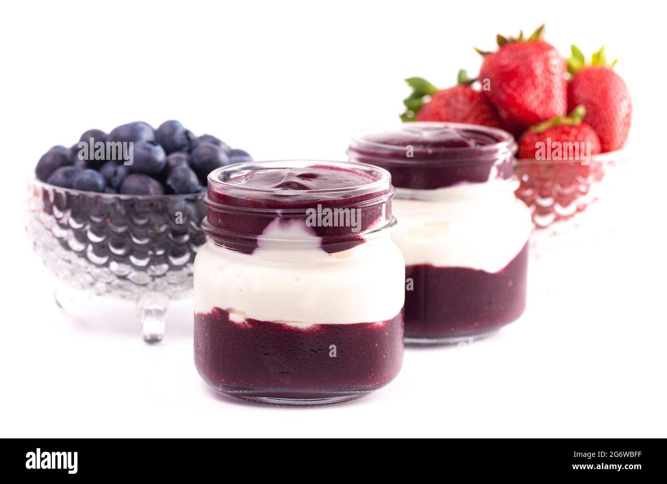 Yogurt and Berry Puree in a Glass Jar for a Healthy Breakfast Stock ...