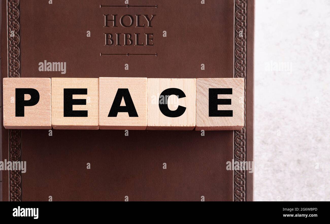 Peace Spelled in Blocks on a Brown Leather Holy Bible Stock Photo - Alamy