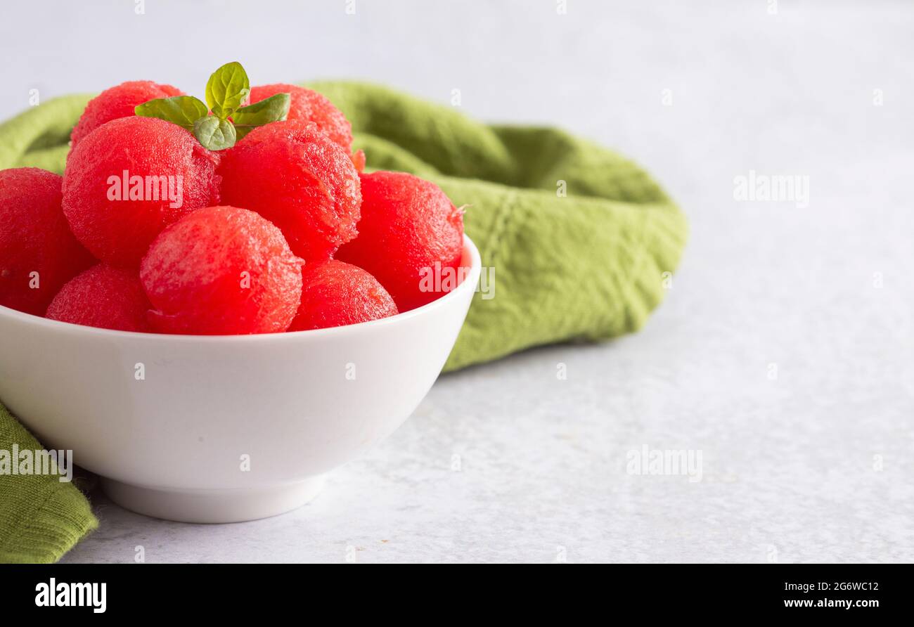 Juicy Watermelon Balls on a White Kitchen Cabinet Stock Photo - Alamy
