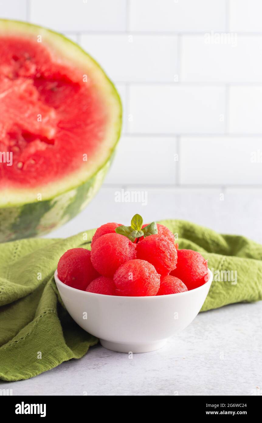 Juicy Watermelon Balls on a White Kitchen Cabinet Stock Photo - Alamy