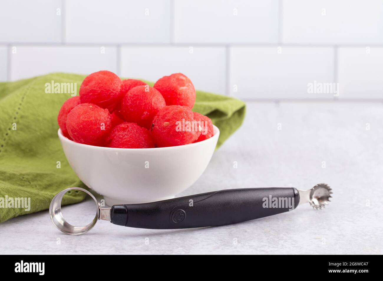 Juicy Watermelon Balls on a White Kitchen Cabinet Stock Photo - Alamy
