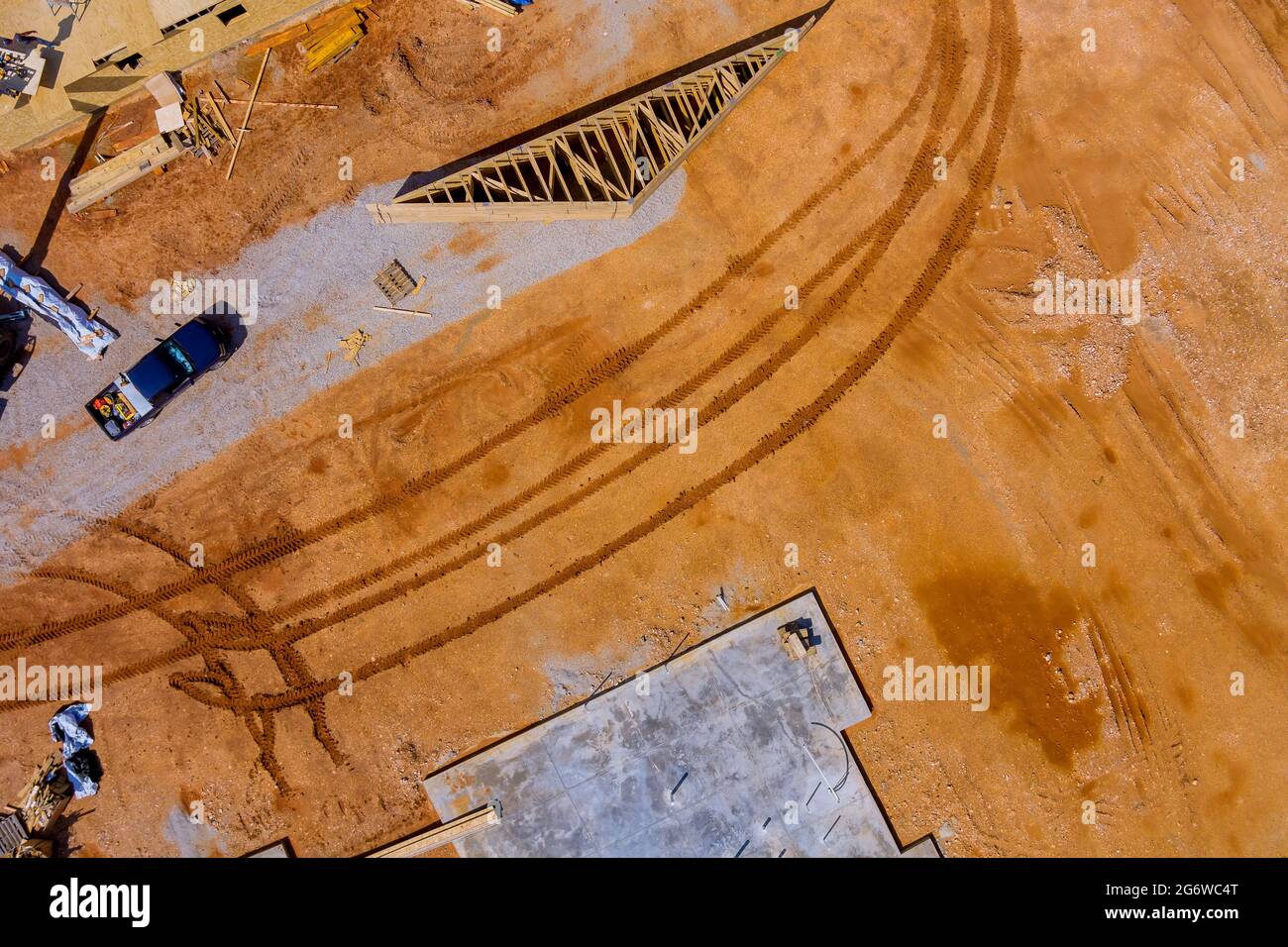 Building site of trenches dug in ground and filled with cement as ...