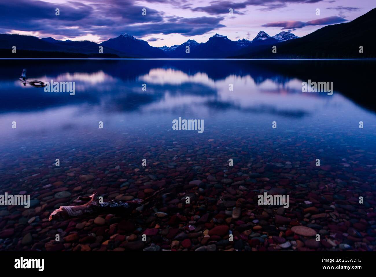 Colorfull peebles stone on lake McDonald shore Stock Photo - Alamy