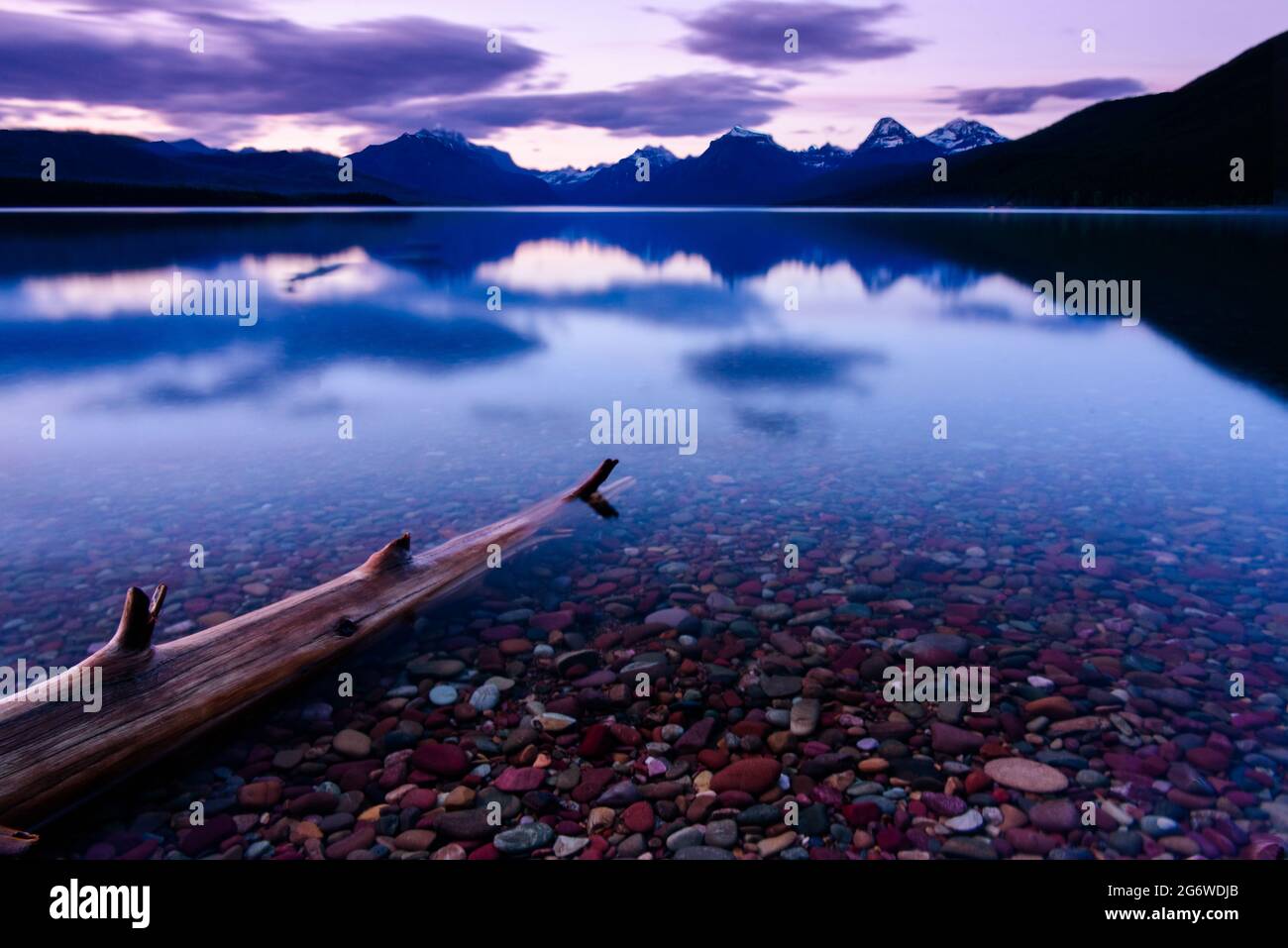 Sunset over lake McDonald Stock Photo - Alamy