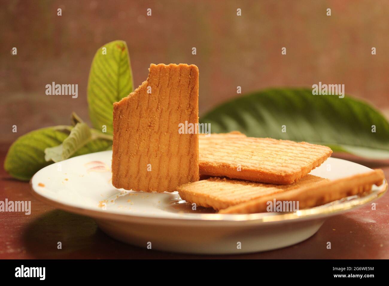 Wheat made biscuits on plate, popular biscuit Stock Photo - Alamy