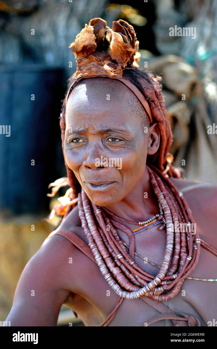 NAMIBIA. HIMBA WOMAN MARRIED AS SHOWN BY HER LEATHER HAT (EREMBE). FOR ...