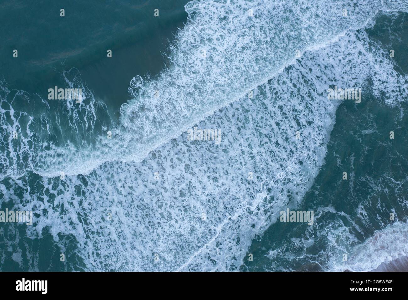 Sea wave running on a shallow coastal strip Stock Photo - Alamy