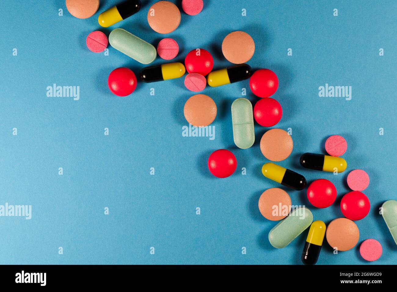 Pills And Capsules Diagonal Line On Blue Flat-lay Stock Photo - Alamy