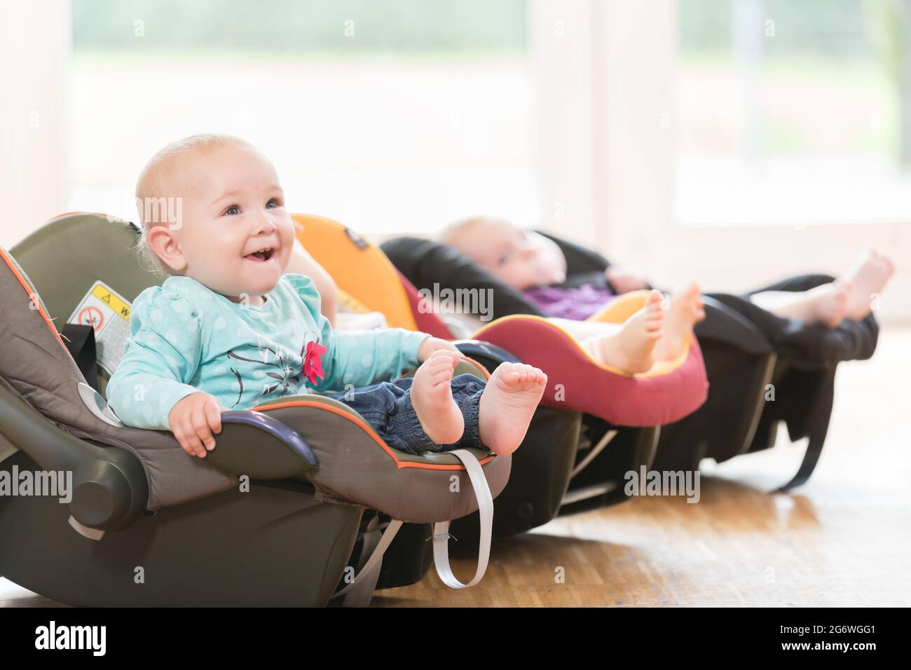 New-born babies in toddler group lying in baby shells Stock Photo - Alamy