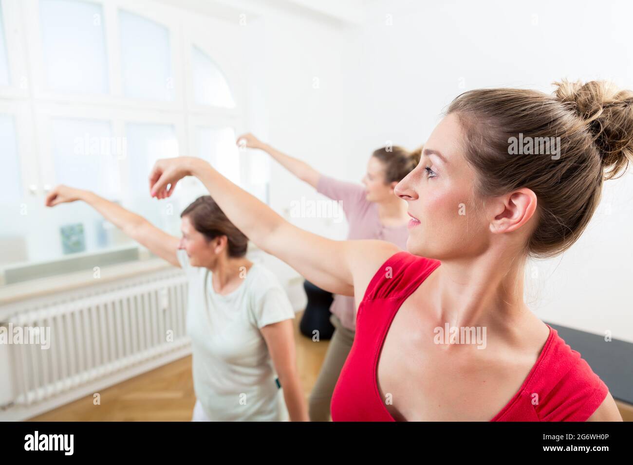 Group young friends stretch hi-res stock photography and images - Alamy