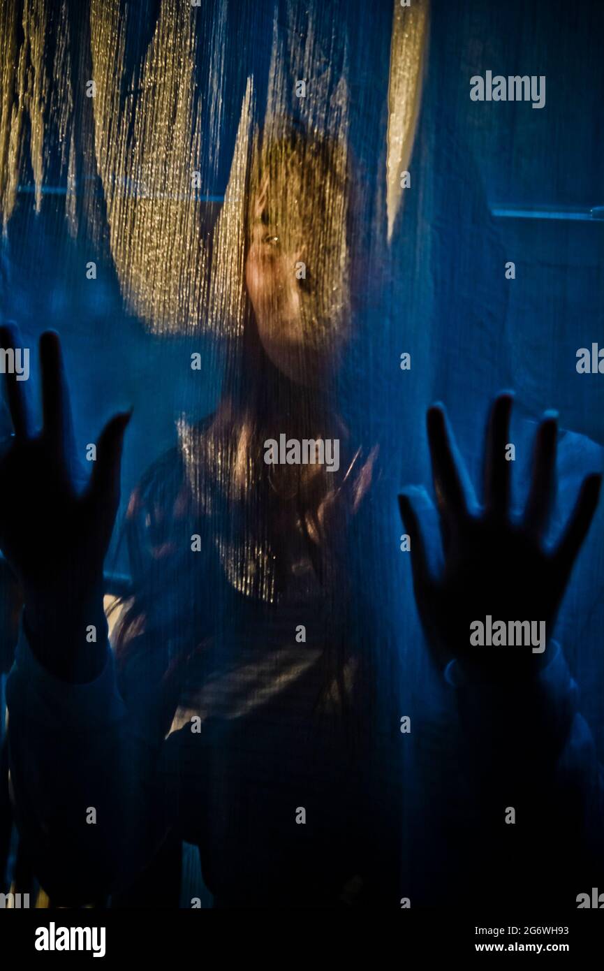 young woman with face obscured by a cloth Stock Photo - Alamy