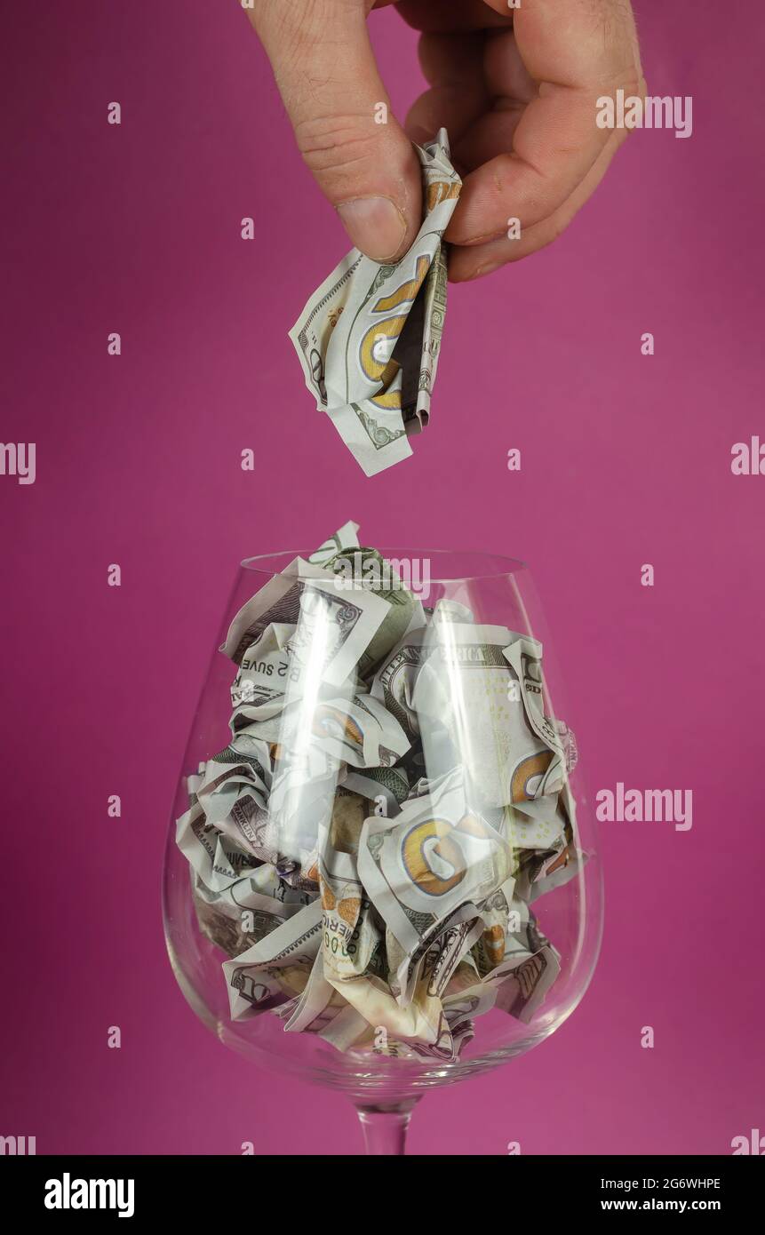 One hundred dollar bills crumpled hi-res stock photography and images ...