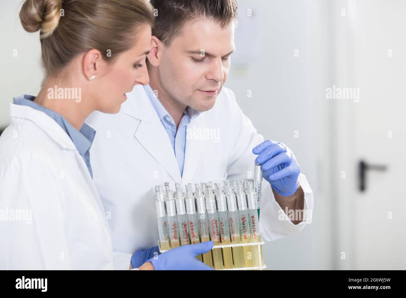 Lab assistants testing hi-res stock photography and images - Alamy