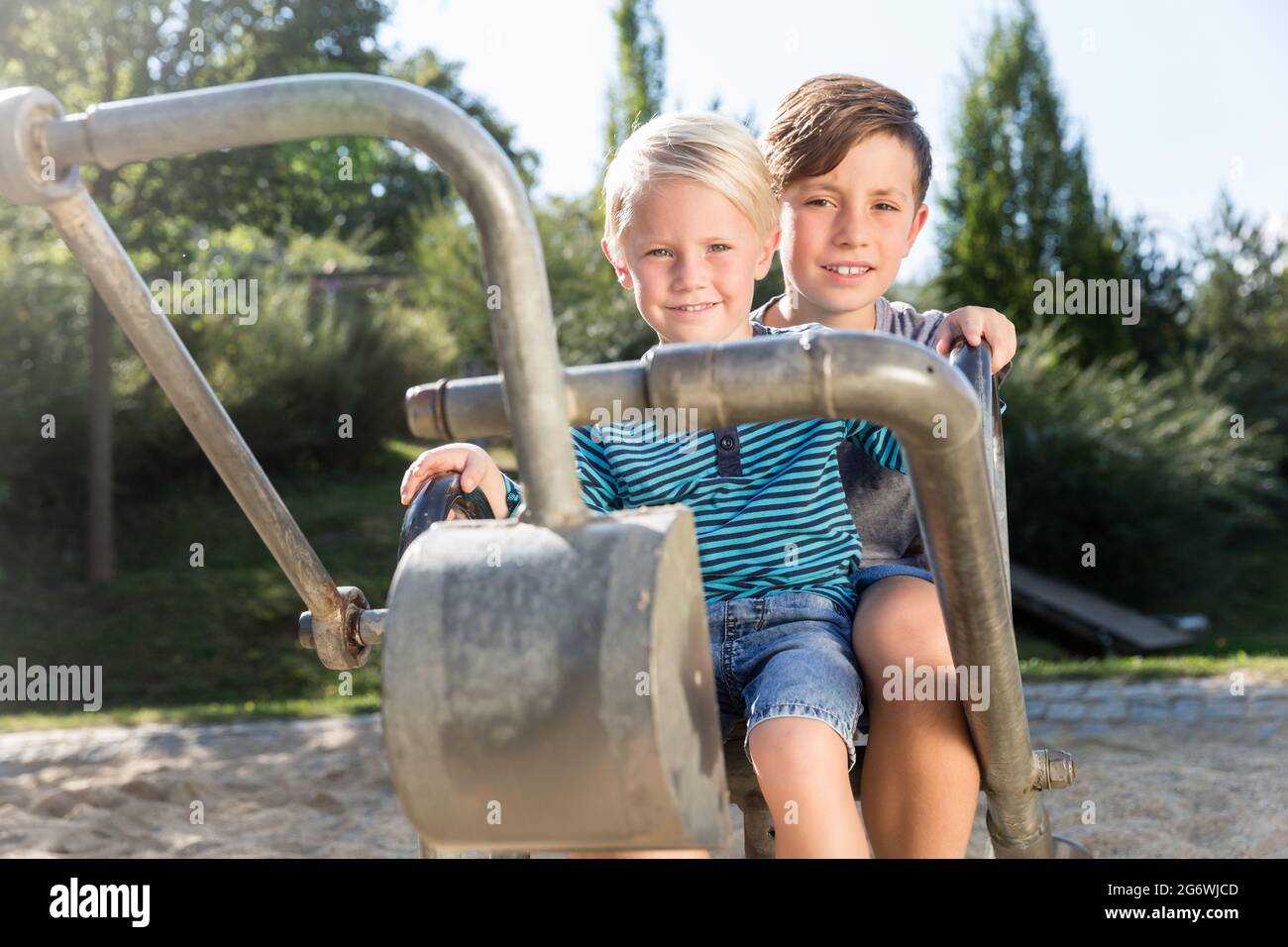 Children using playground hi-res stock photography and images - Alamy