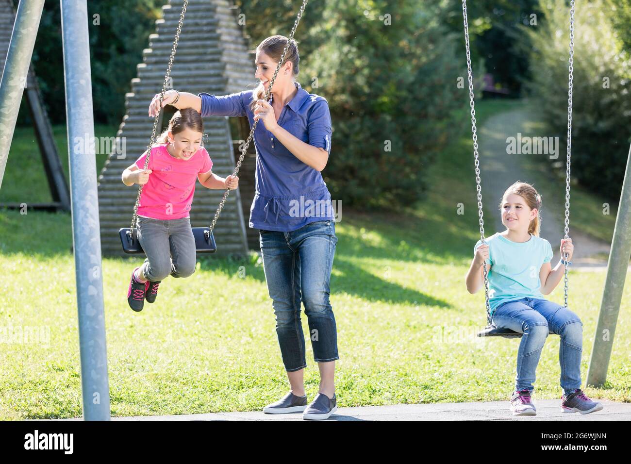 Two girls playing park playground hi-res stock photography and images - Alamy