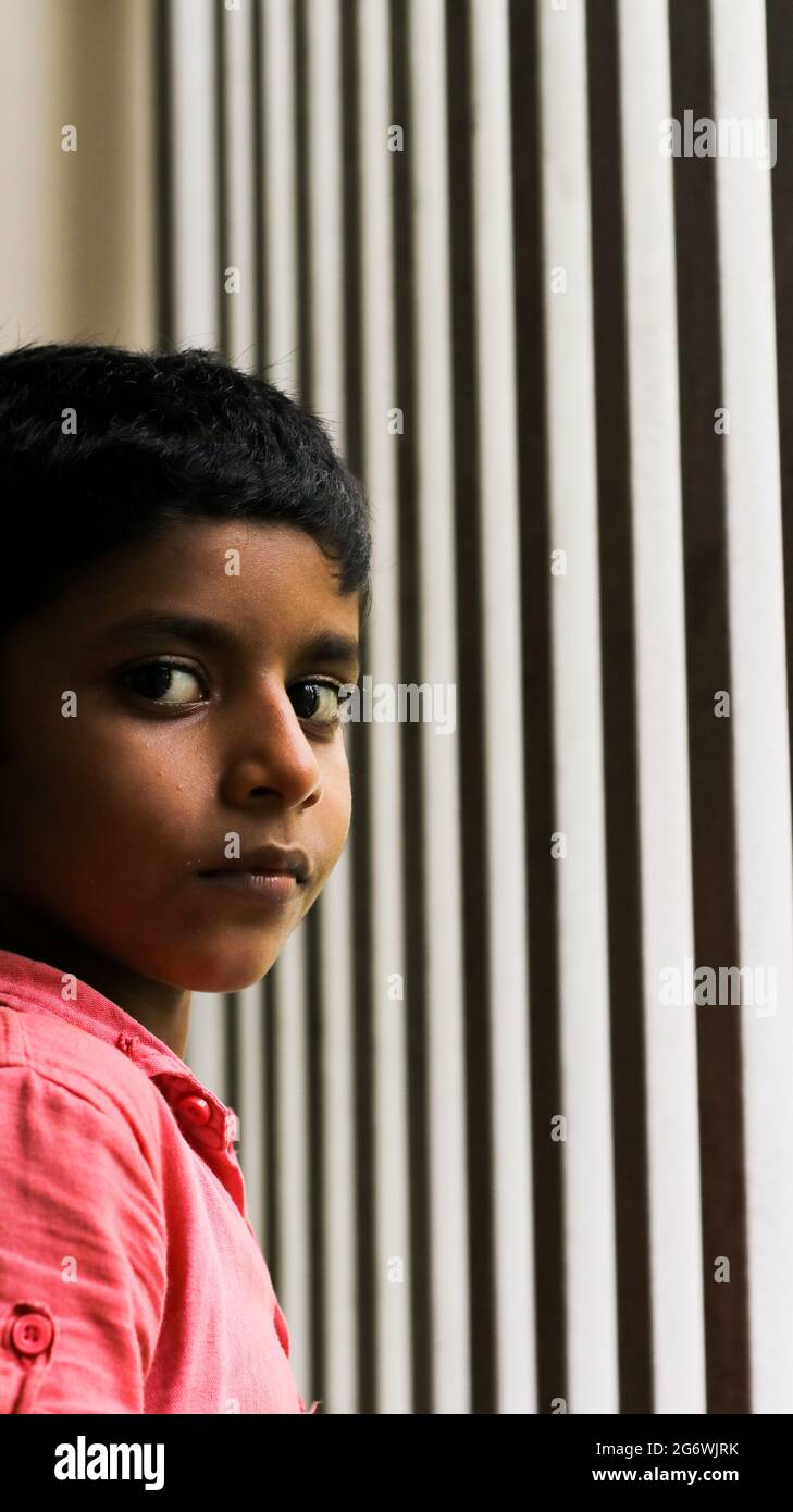 Black and white photo of a boy looking at the hi-res stock photography ...