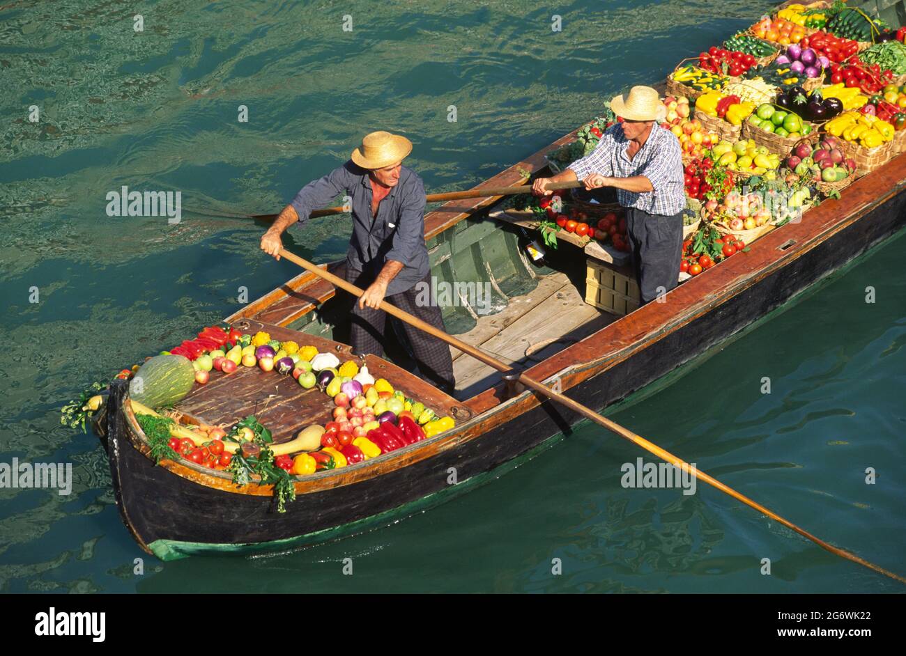 ITALY. VENETIA. VENICE. OLD BOAT USED BY THE FARMERS WITH FRUITS AND ...