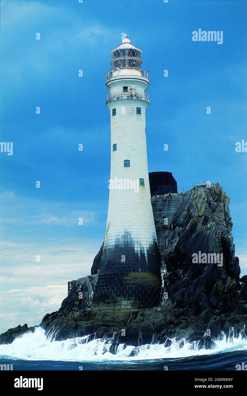 IRELAND. CORK. AWAY AT SEA FROM THE HARBOUR OF KINSALE, THE LIGHTHOUSE ...