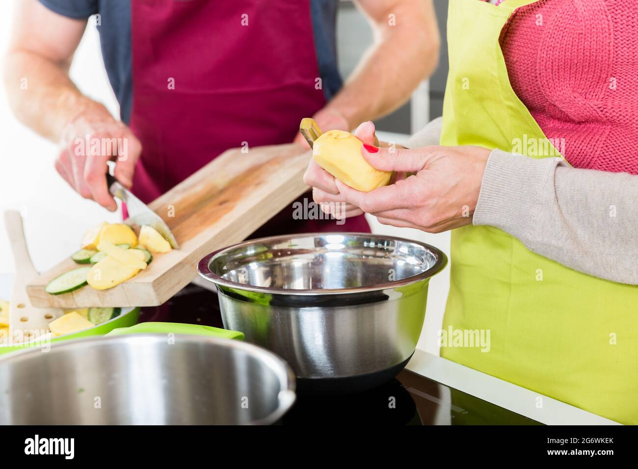 Woman cooking dish man hi-res stock photography and images - Alamy