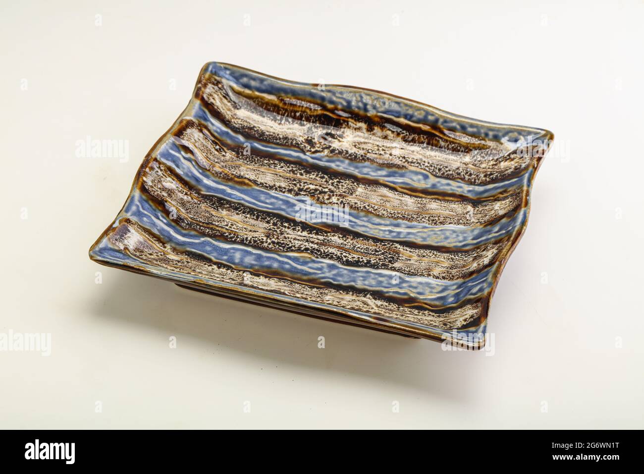 Empty color plate for kitchen isolated Stock Photo - Alamy