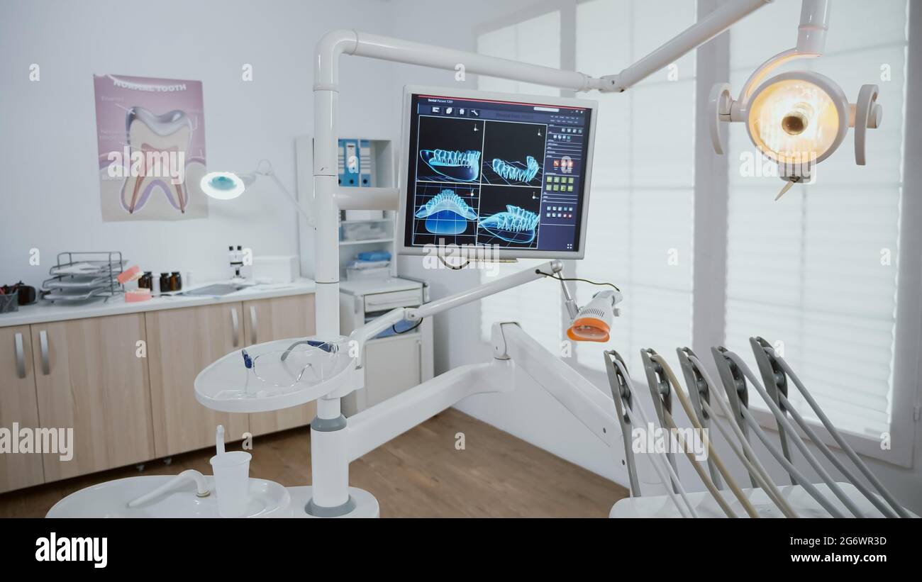 Empty stomatology orthodontic office room equipped with professional ...