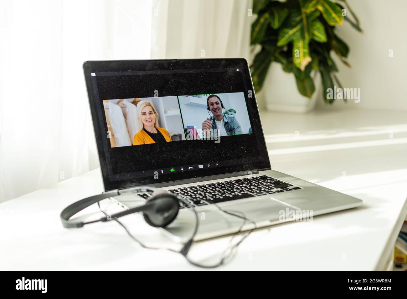 Online conference of colleagues through a laptop. Video call for ...
