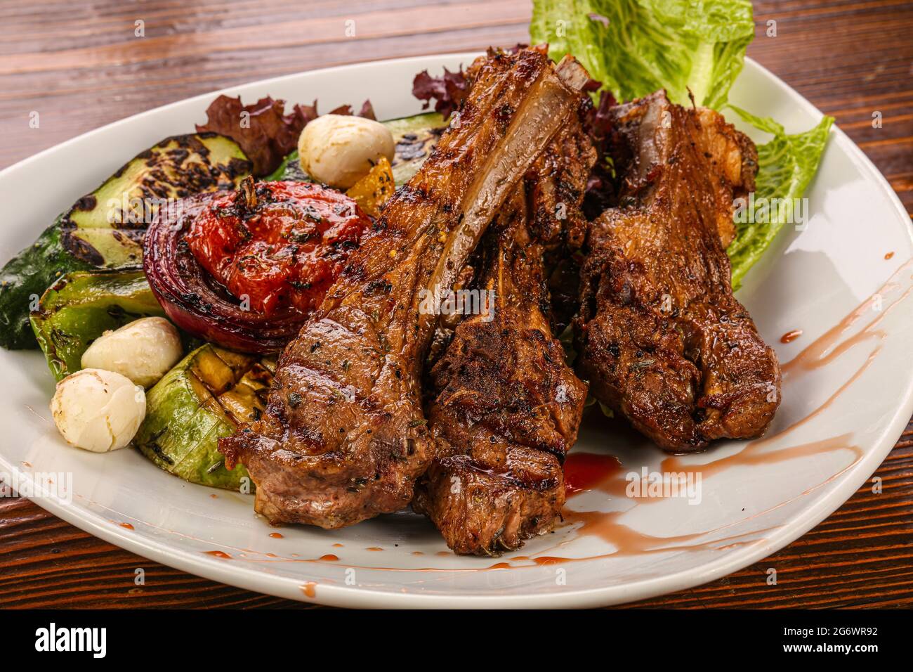 Pork loin kebab grilled barbeque served vegetables Stock Photo - Alamy