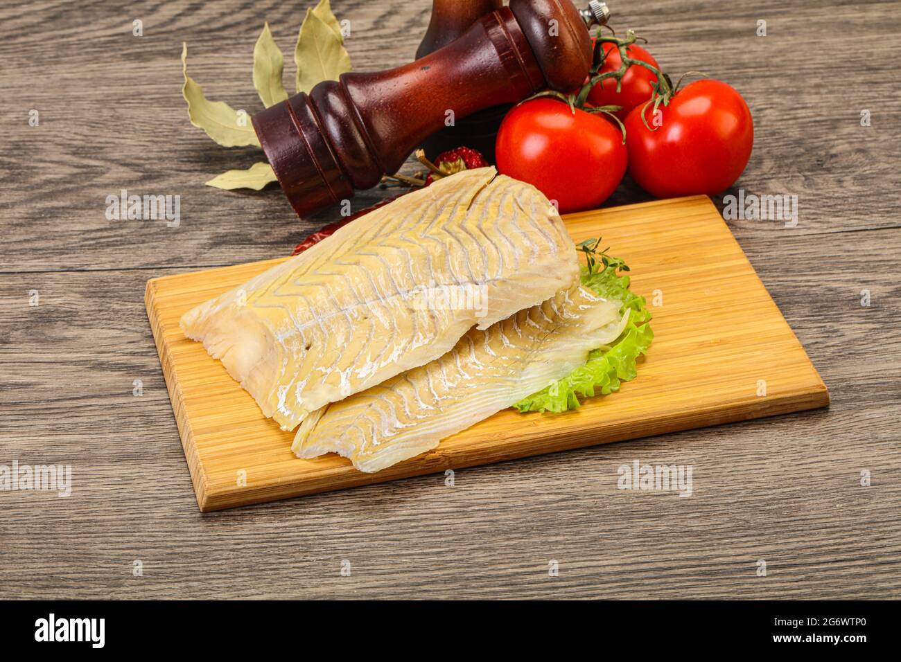 Raw cod fish fillet for cooking Stock Photo - Alamy