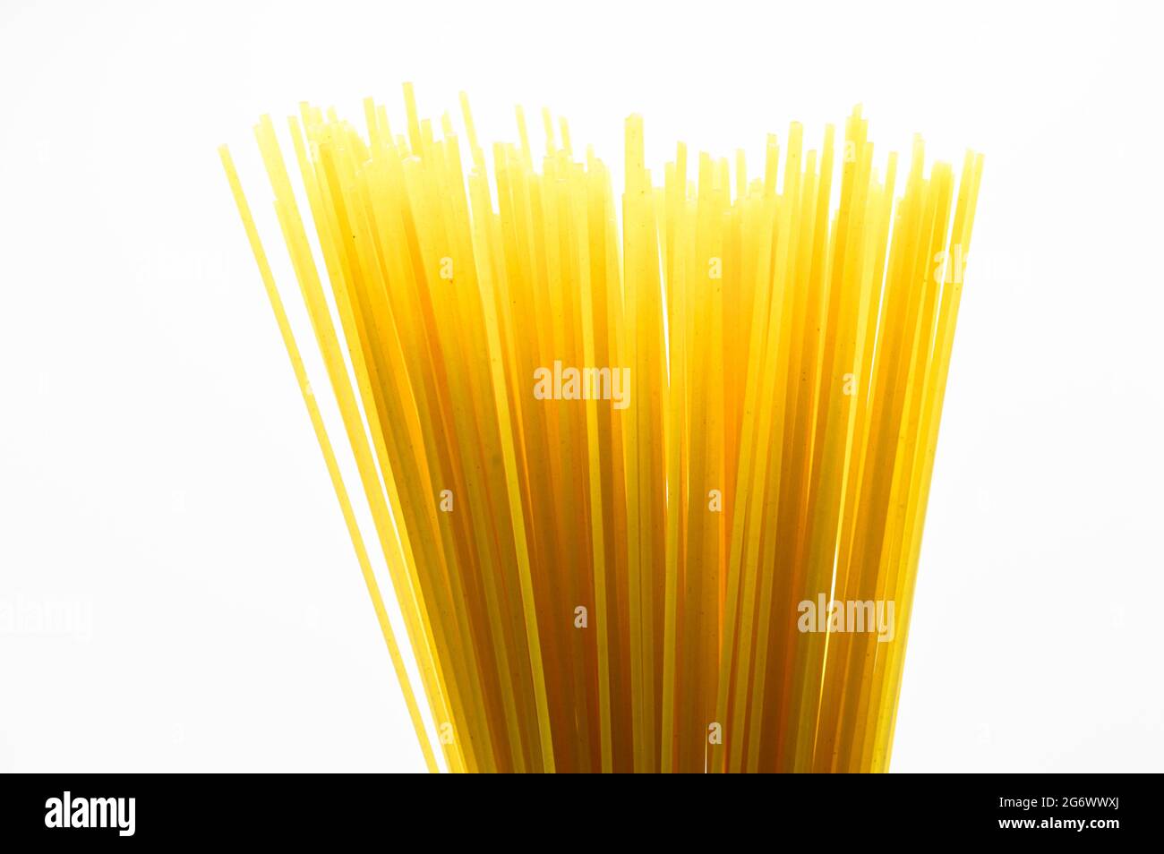 Long raw fresh and healthy dry macaroni pasta, isolated on white ...