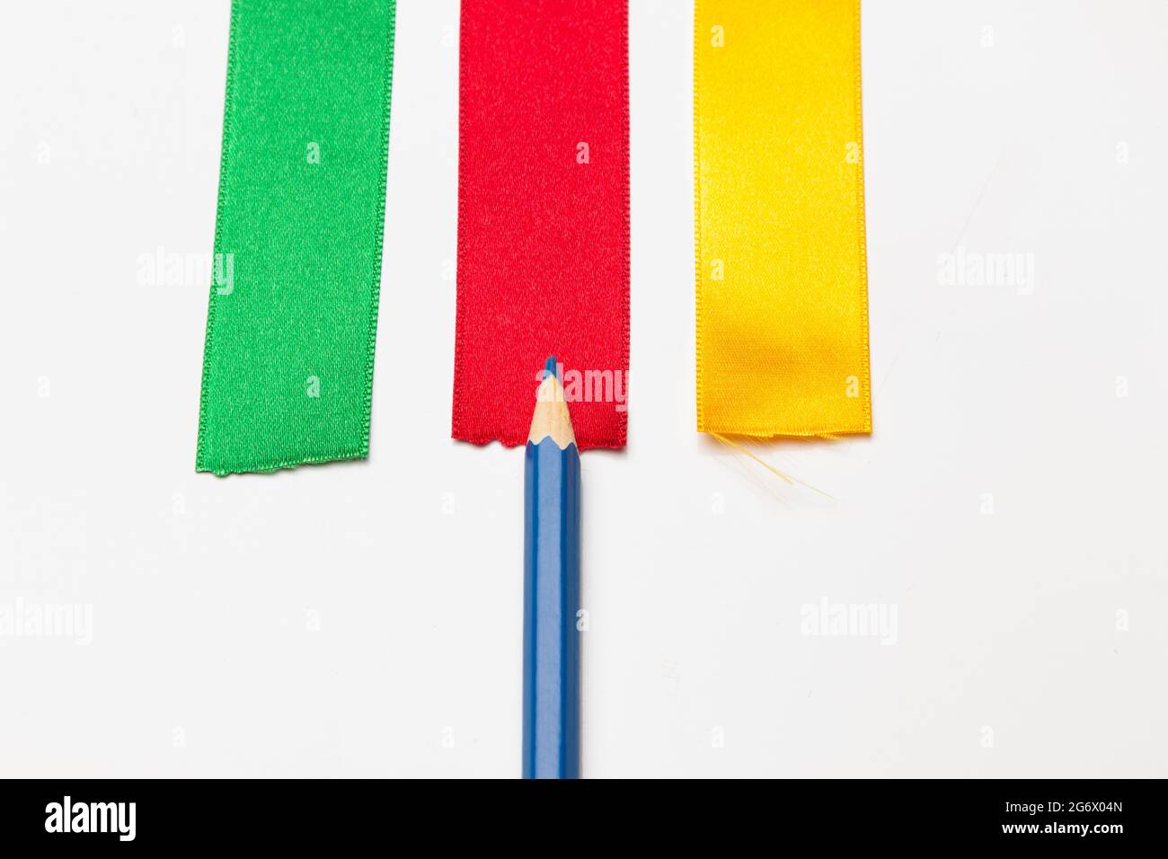 Give coloured pencils as gifts. Bouquet of coloured pencils surrounded ...